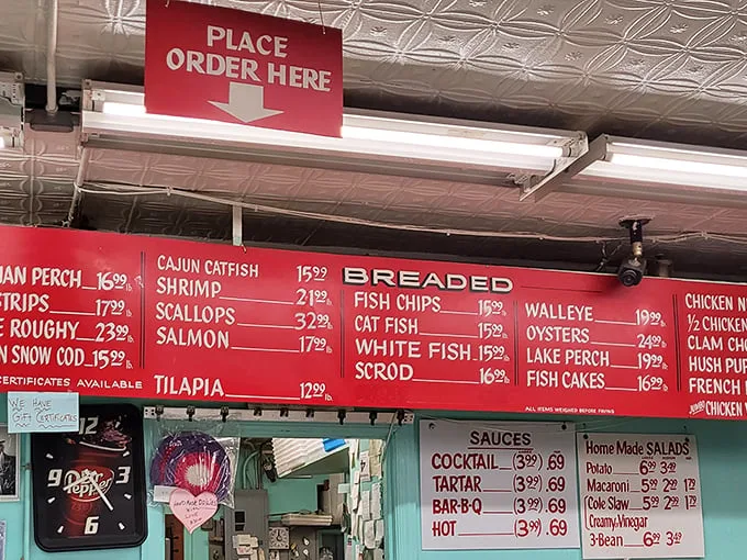 The red menu board reads like a love letter to seafood lovers. Decisions, decisions – it's the most delicious kind of stress.