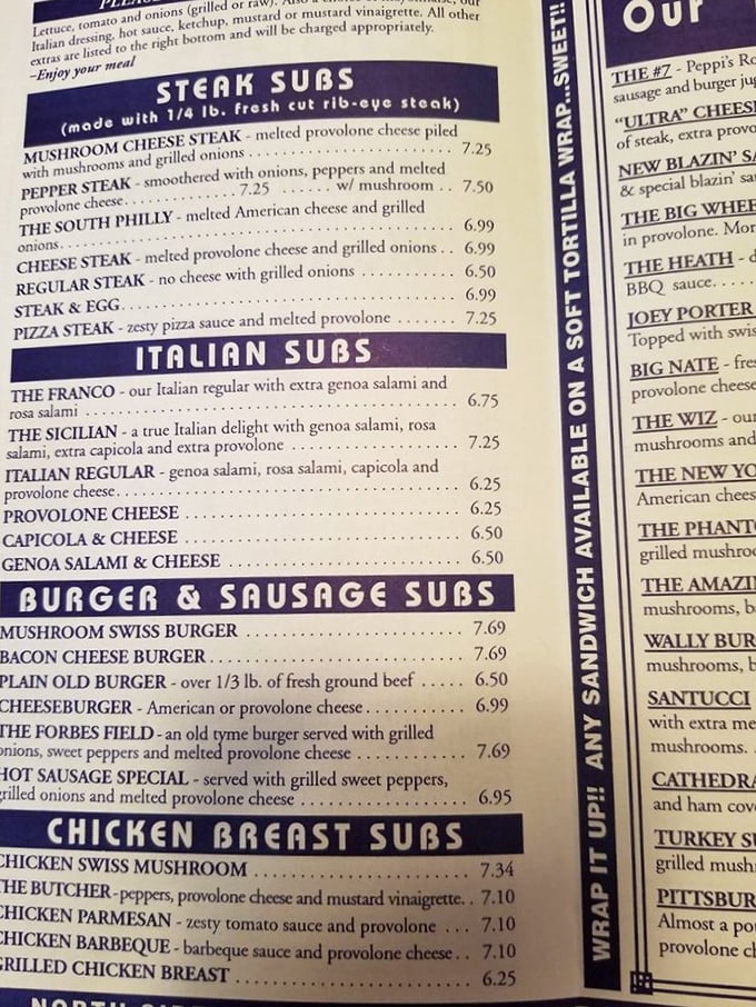 The menu board at Peppi's reads like poetry for the perpetually hungry. Each line promises satisfaction that fancy restaurants charge triple for.