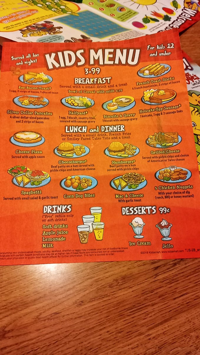 The kids' menu – where silver dollar pancakes meet corn dog bites. Childhood happiness printed on orange paper, complete with ice cream that costs less than your morning coffee.
