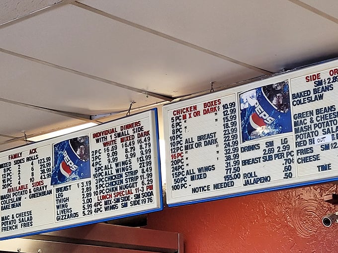 A menu board that tells you everything you need to know—chicken reigns supreme here, with sides playing worthy supporting roles.