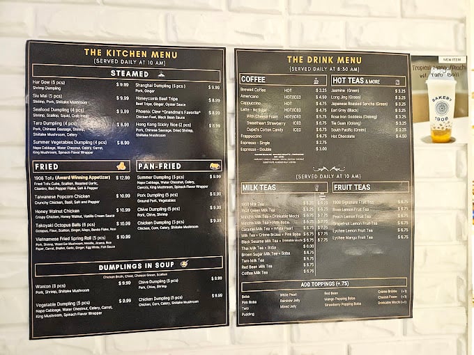 The menu board reveals Bakery 1908's true identity—not just pastries, but a dumpling paradise with an impressive array of teas to match.