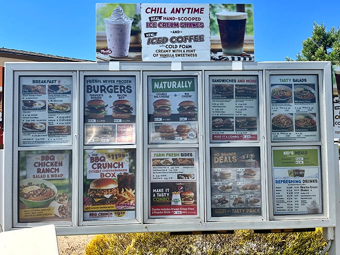The drive-thru menu board is like a roadmap to happiness – breakfast classics, never-frozen burgers, and hand-scooped shakes all competing for your attention.