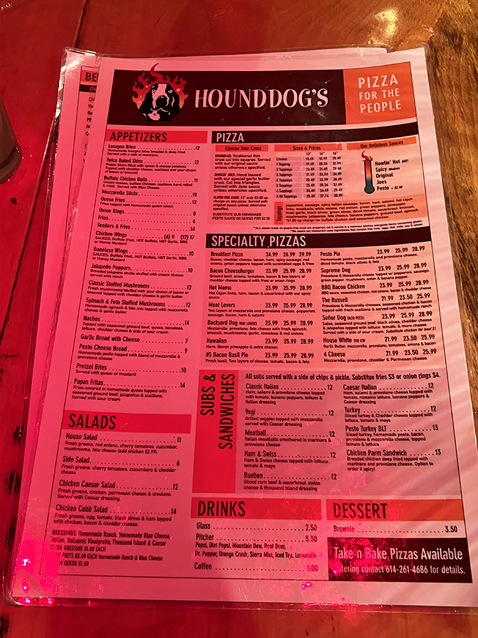 The menu at Hounddog's tells a delicious story – "Pizza for the People" isn't just a slogan, it's a mouthwatering promise kept with every order.