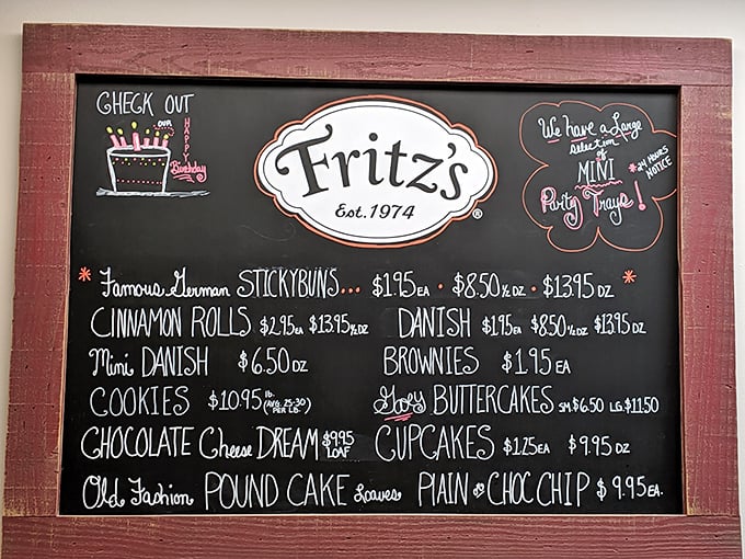 The chalkboard menu reads like poetry to dessert lovers. Notice how "Famous German Sticky Buns" rightfully claims the top spot—a star deserves billing.