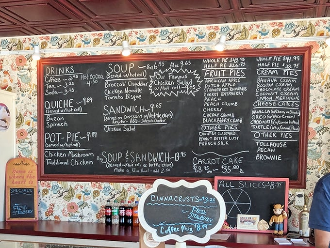 The chalkboard menu reads like poetry to hungry travelers – a siren song of fruit pies, cream pies, and savory options that make decision-making deliciously difficult.