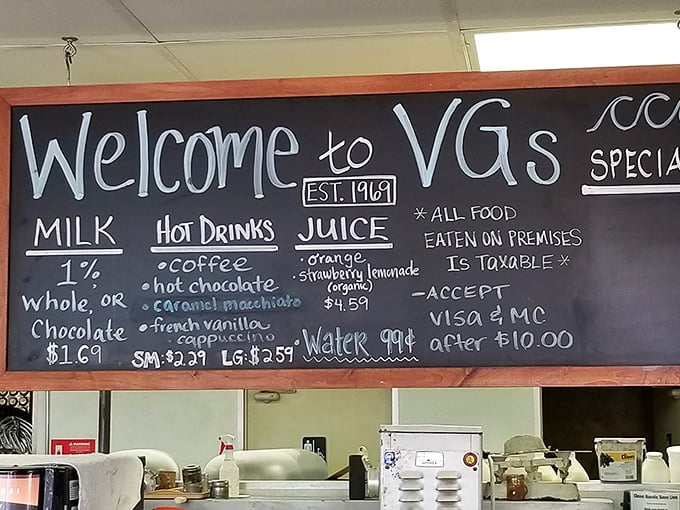 That chalkboard menu reads like a love letter to simplicity—no fancy fonts needed when your donuts speak volumes.