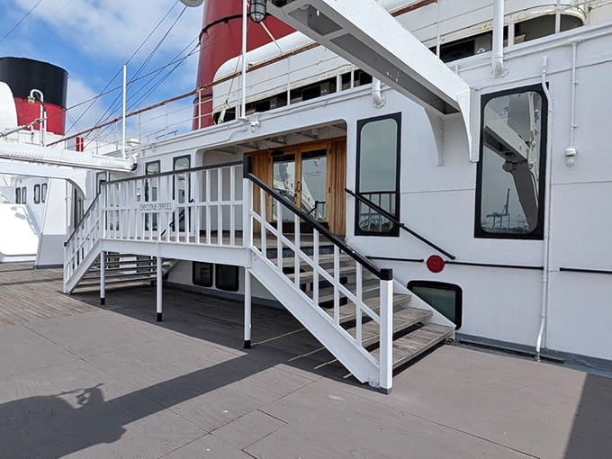 Like a floating time capsule, the Queen Mary's pristine white exterior belies the countless stories—and perhaps a few restless spirits—contained within her hull.