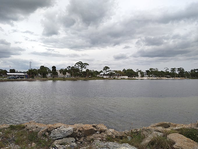 Gaze across St. Joseph Bay's tranquil waters where dramatic clouds create nature's own IMAX show, completely free of charge and concession stand prices.