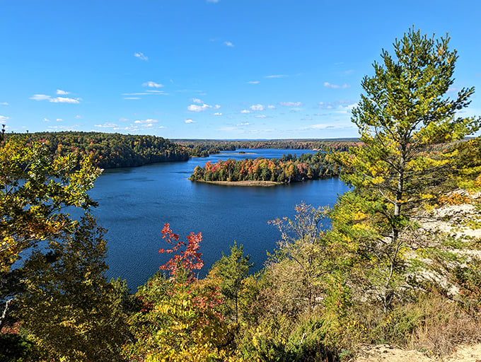 Fall colors frame this pristine waterway view, proving that Mother Nature might have been showing off a bit when she designed Northern Michigan.