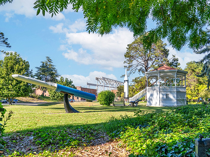 This park gazebo has witnessed more first kisses and retirement celebrations than a Hallmark movie marathon. The torpedo adds that special "only in a naval town" flair.