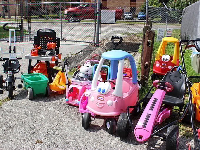 A rainbow coalition of Little Tikes cars, because every toddler deserves wheels with more personality than a sedan.