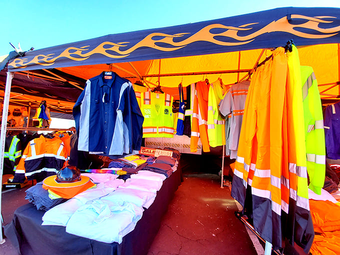 High-visibility fashion statement! This vibrant collection of safety gear proves that even practical workwear can make a splash in Oakland's most democratic shopping experience.
