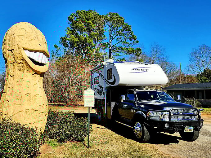 Nothing says "roadtrip worthy" like a camper pulling up to meet America's happiest peanut. This is peak highway Americana, folks.