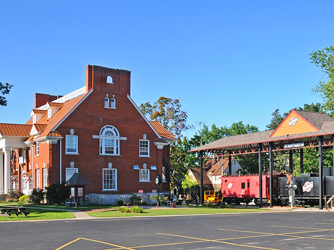 Step into a postcard where red brick museums and vintage trains whisper tales of simpler times to curious visitors.