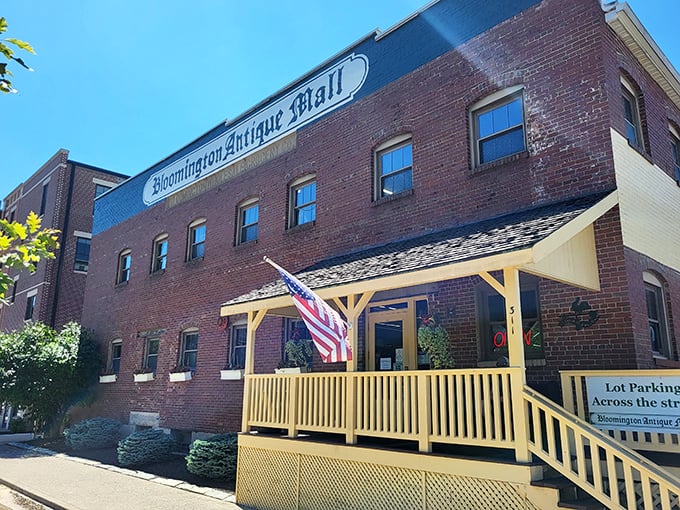 That yellow porch and American flag give Bloomington Antique Mall the charm of a Norman Rockwell painting come to life.