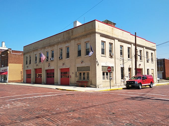 Bradford’s historic fire station stands strong with its red doors and brick exterior, a reminder of civic pride along the town’s brick-paved streets.