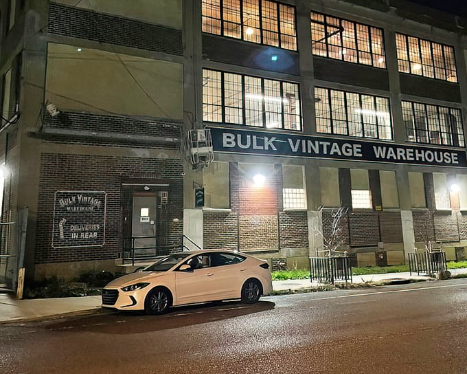 By night, the Bulk Vintage Warehouse stands like a vault of fashion history—waiting to reveal its treasures to the next generation of style seekers.
