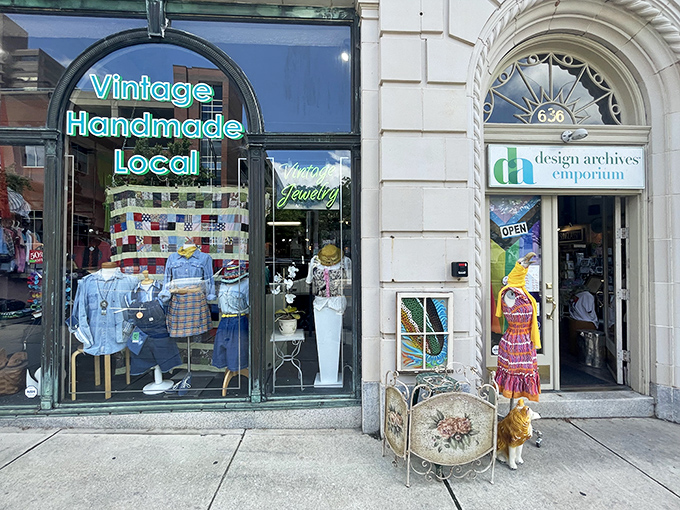 Design Archives in Winston-Salem showcases its vintage and handmade treasures right in the window. That neon "Vintage Handmade Local" sign is basically catnip for thrift enthusiasts!