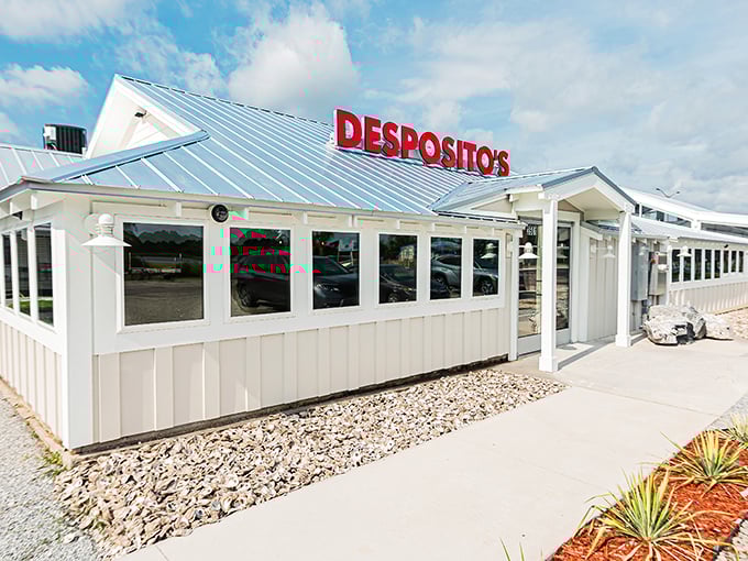 Desposito's clean white exterior hides a seafood lover's paradise. Like finding a pearl in an oyster – simple outside, treasure inside.