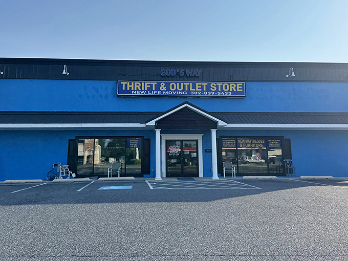That cheerful blue building practically shouts "come find amazing deals" from the busy Coastal Highway.