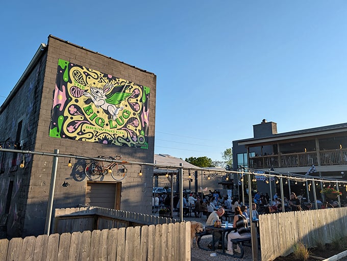 That colorful mural says "we're fun" while the smoker out back whispers "but we're dead serious about barbecue.
