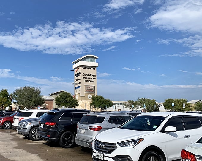 This tower stands tall like a beacon calling all bargain hunters to discount heaven below.