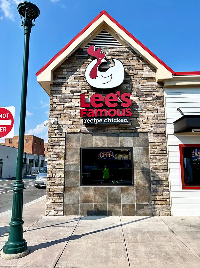 Lee's cheerful chicken mascot knows what's coming, and honestly, it seems pretty happy about its fate.