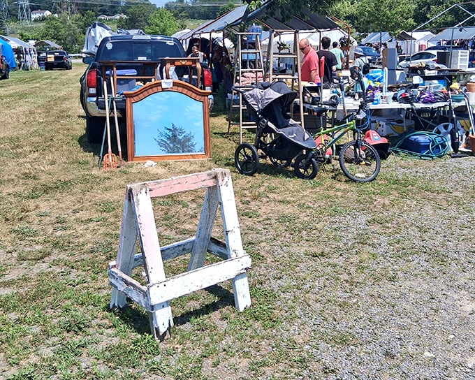 Londonderry's field of dreams—where vintage mirrors lean against truck tailgates and every table holds someone's future conversation piece.
