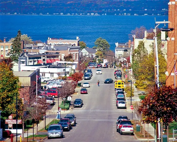 Petoskey's downtown invites you to stroll, shop, and savor the moment. Those awnings aren't just pretty—they're shade for serious shoppers!