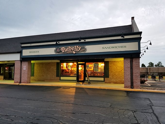 The warm glow through those windows promises toasted perfection and comfort food done absolutely right.