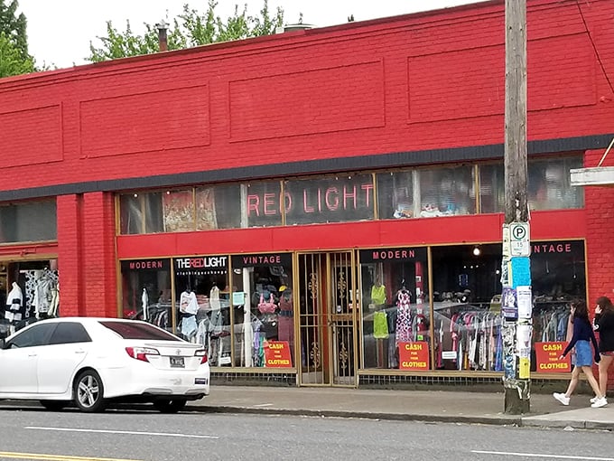 Red Light's vintage storefront glows like a beacon for fashion lovers seeking authentic secondhand style.