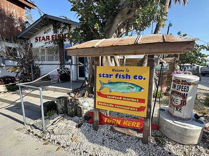 That weathered sign promises more than directions—it's pointing you toward seafood nirvana. Follow it faithfully.