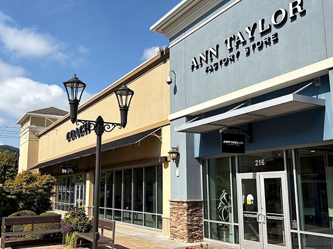 Charming storefronts and decorative lanterns create an inviting atmosphere where shopping feels like strolling through town.