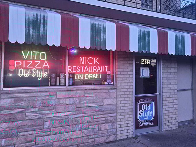 That striped awning screams old-school Chicago louder than Sinatra at a Sox game – pure South Side magic.