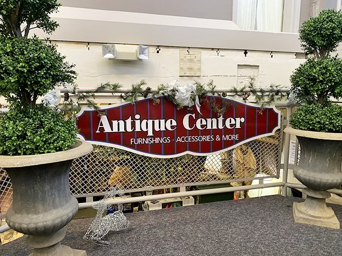The elegant entrance to Savage Mill's Antique Center promises refined discoveries. Those potted topiaries stand guard over decades of beautiful craftsmanship.