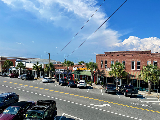 Victorian houses line these brick streets like pastel wedding cakes, sweet reminders of Florida's elegant past.