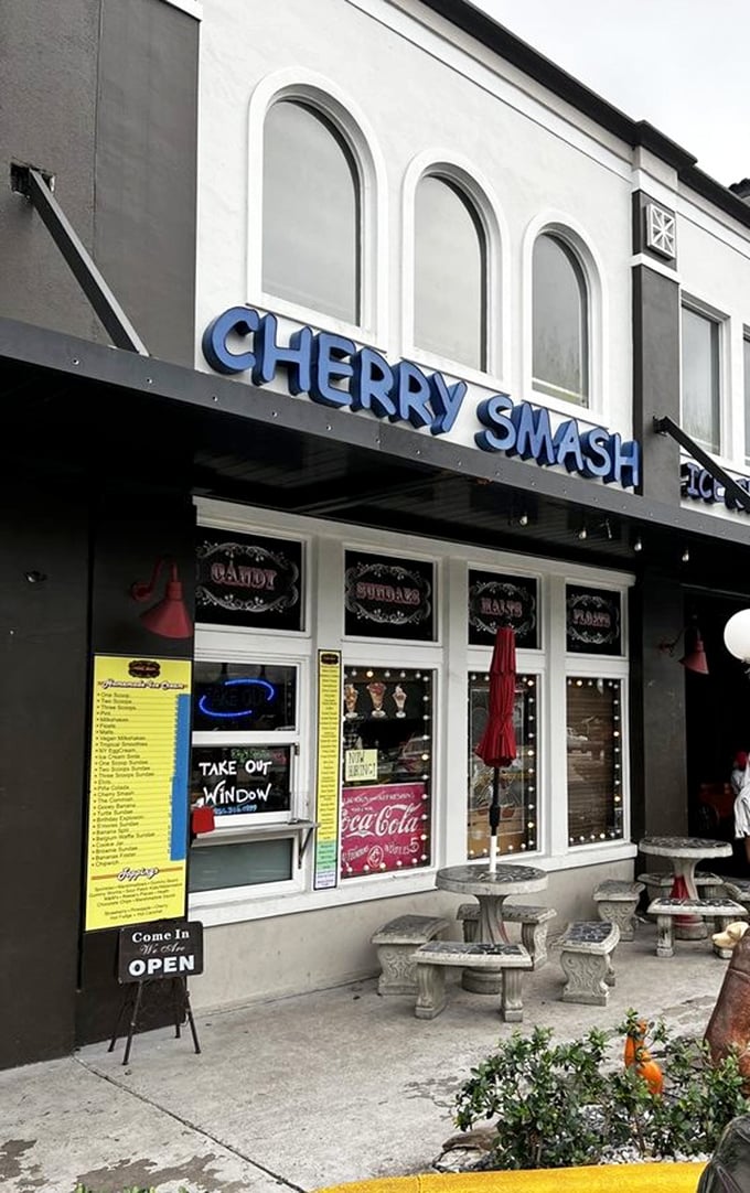 Clean lines and bright promises – sometimes the best milkshakes hide behind the simplest storefronts.