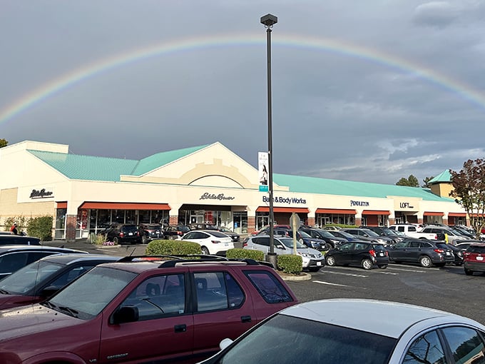 A perfect rainbow arches over Columbia Gorge Outlets, Mother Nature's own "SALE" sign for lucky shoppers.