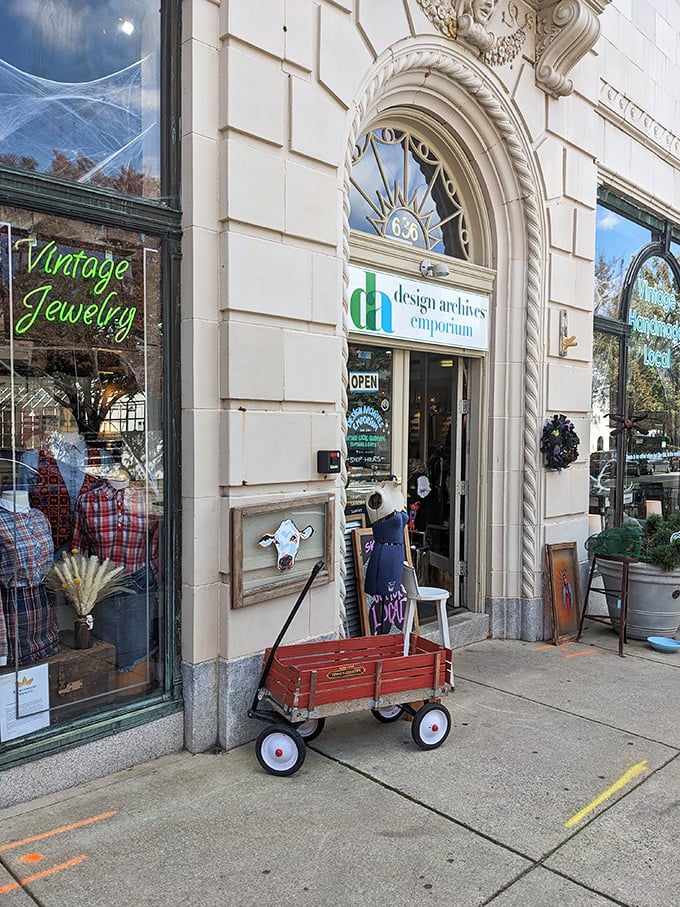 The elegant arched entrance of Design Archives Emporium hints at the architectural history of downtown Winston-Salem. That little red wagon out front? Just begging to be filled with vintage finds!