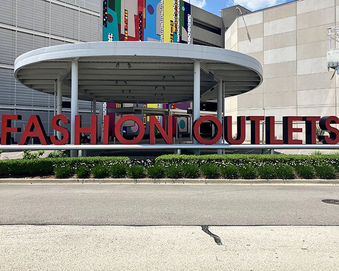 Those bold red letters spell out exactly what you're hoping for - fashion outlets that deliver designer dreams at realistic prices.