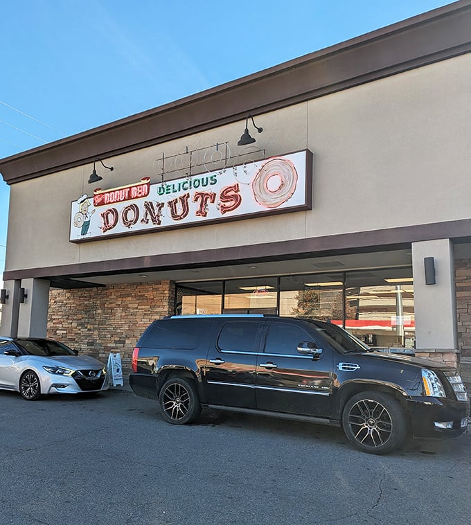 The Donut Den's classic storefront promises no-nonsense deliciousness – they were "artisanal" before it was cool.