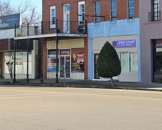 Historic brick meets modern convenience on Grenada's main drag, complete with custom software and hair magic.