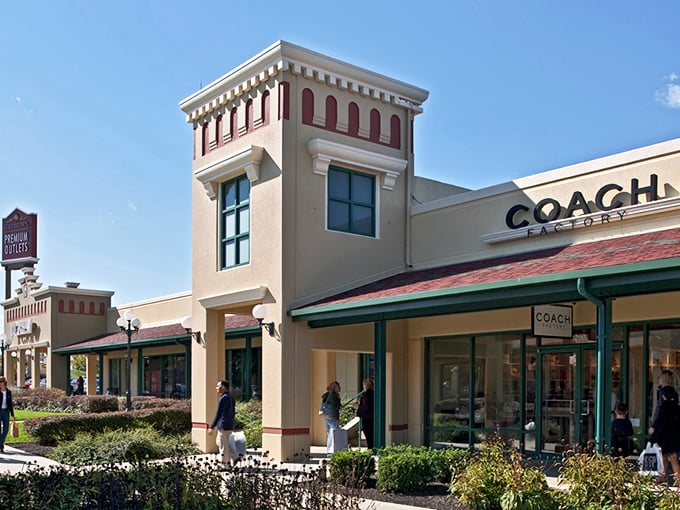 Western Maryland sunshine bathes these storefronts in golden light. Coach and other luxury brands await without the luxury price tags!