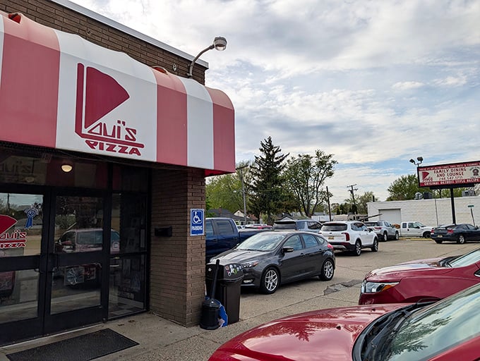 Classic pizza parlor architecture that's seen generations of families create memories over square-cut slices of heaven.