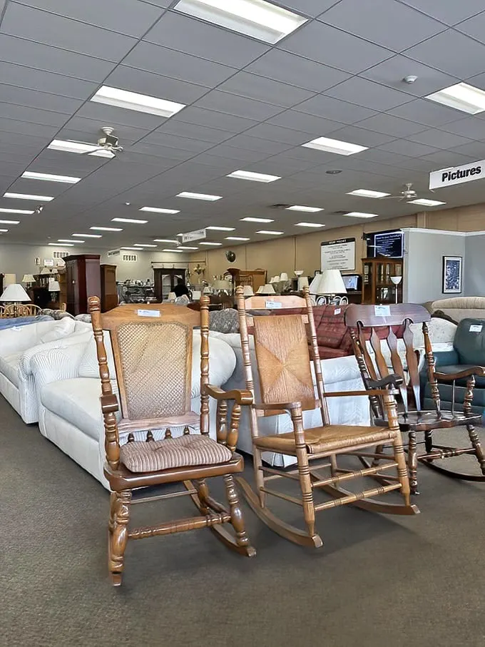 Those rocking chairs are practically begging for front porch stories and sweet tea conversations.