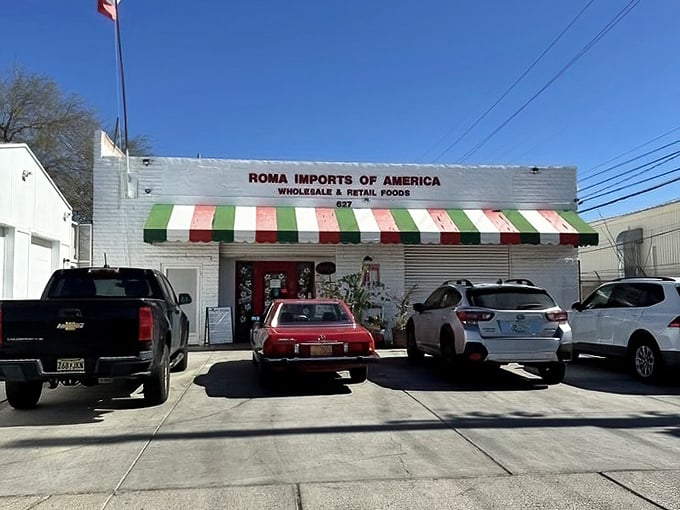 The green, white, and red awning waves like Italy's flag, promising authentic flavors within.