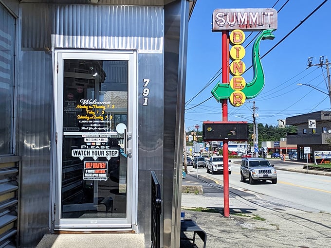 The neon "DINER" sign at Summit has likely guided generations of road-weary families toward comfort food salvation.