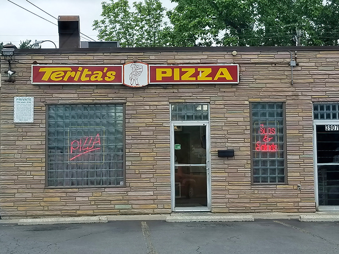 The simple storefront proves that sometimes the quietest places make the loudest flavor statements.