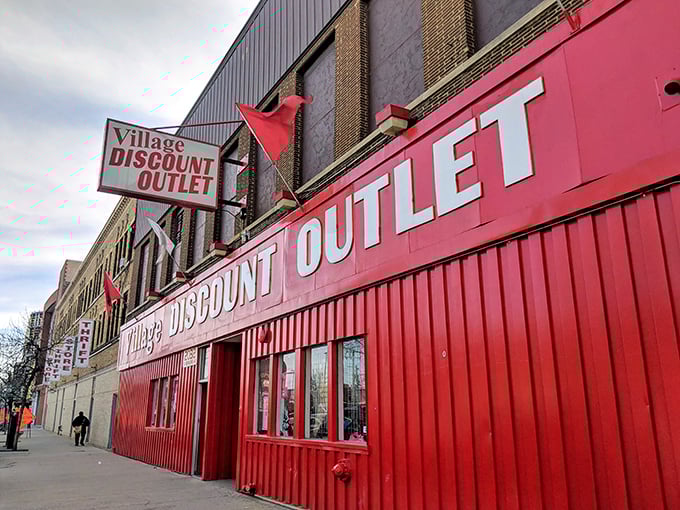 Village Discount's vibrant red exterior isn't just eye-catching—it's a promise of the colorful treasures waiting inside.