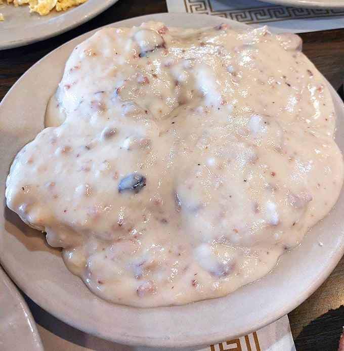 Behold the crown jewel of Country Way – biscuits smothered in sausage gravy so good, you'll want to write poetry about it. Breakfast alchemy at its finest.